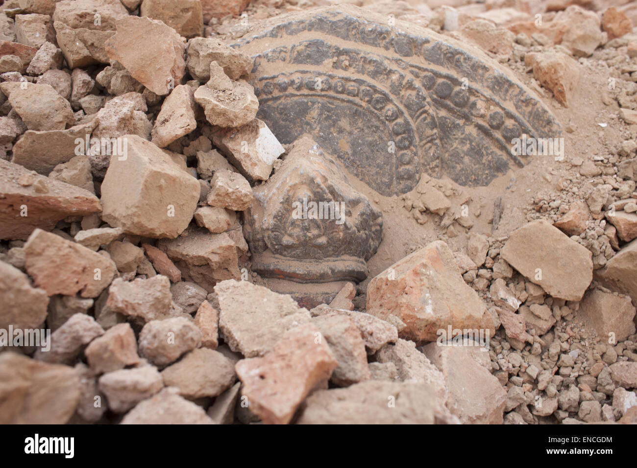 Nepal. 2nd May, 2015. A destroyed artifact lays in the ground of the ...