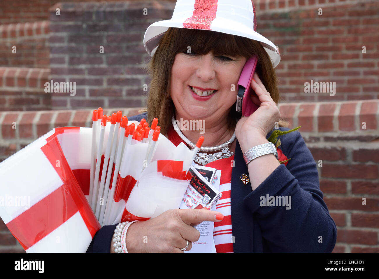 Lady with flags at St George's day parade, Nottingham. England Stock ...