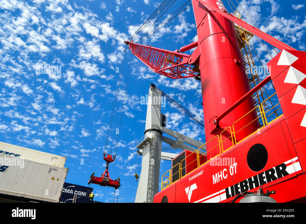Transnet crane loading containers in the port of Cape Town, South ...