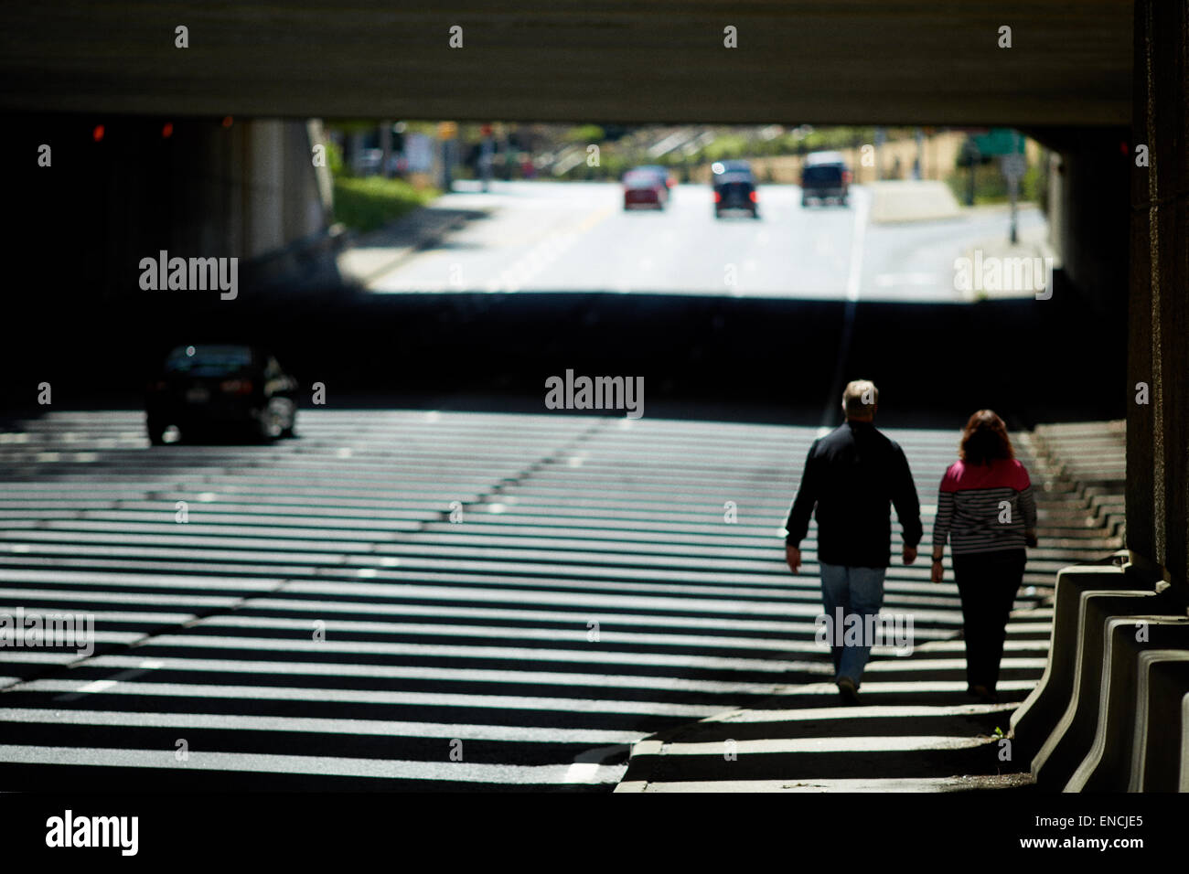 Midtown Atlanta in Georgia USA pedestrians walking past a freeway under ...