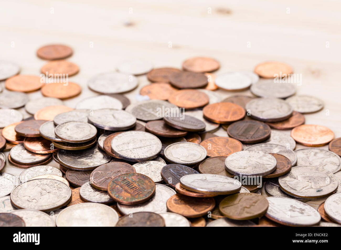 American coins on wood table Stock Photo - Alamy
