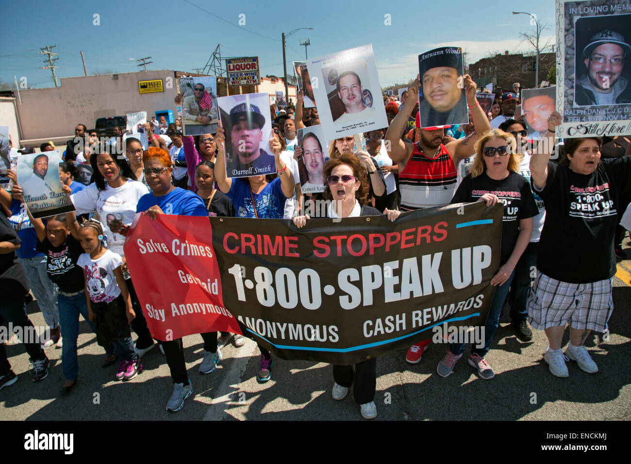 Detroit, Michigan, USA. 2nd May, 2015. Holding pictures of homicide ...