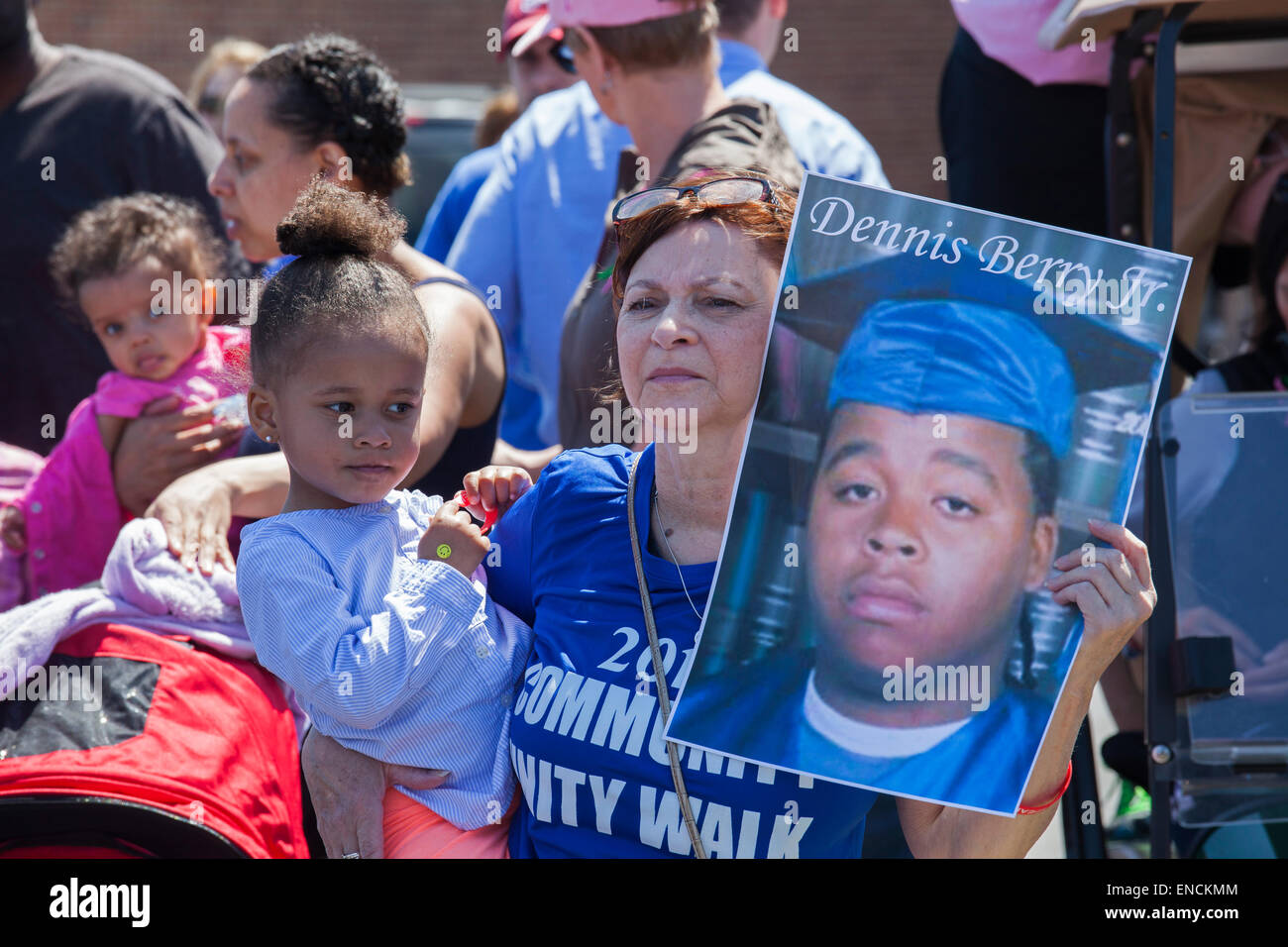 Detroit, Michigan, USA. 2nd May, 2015. Holding pictures of homicide ...