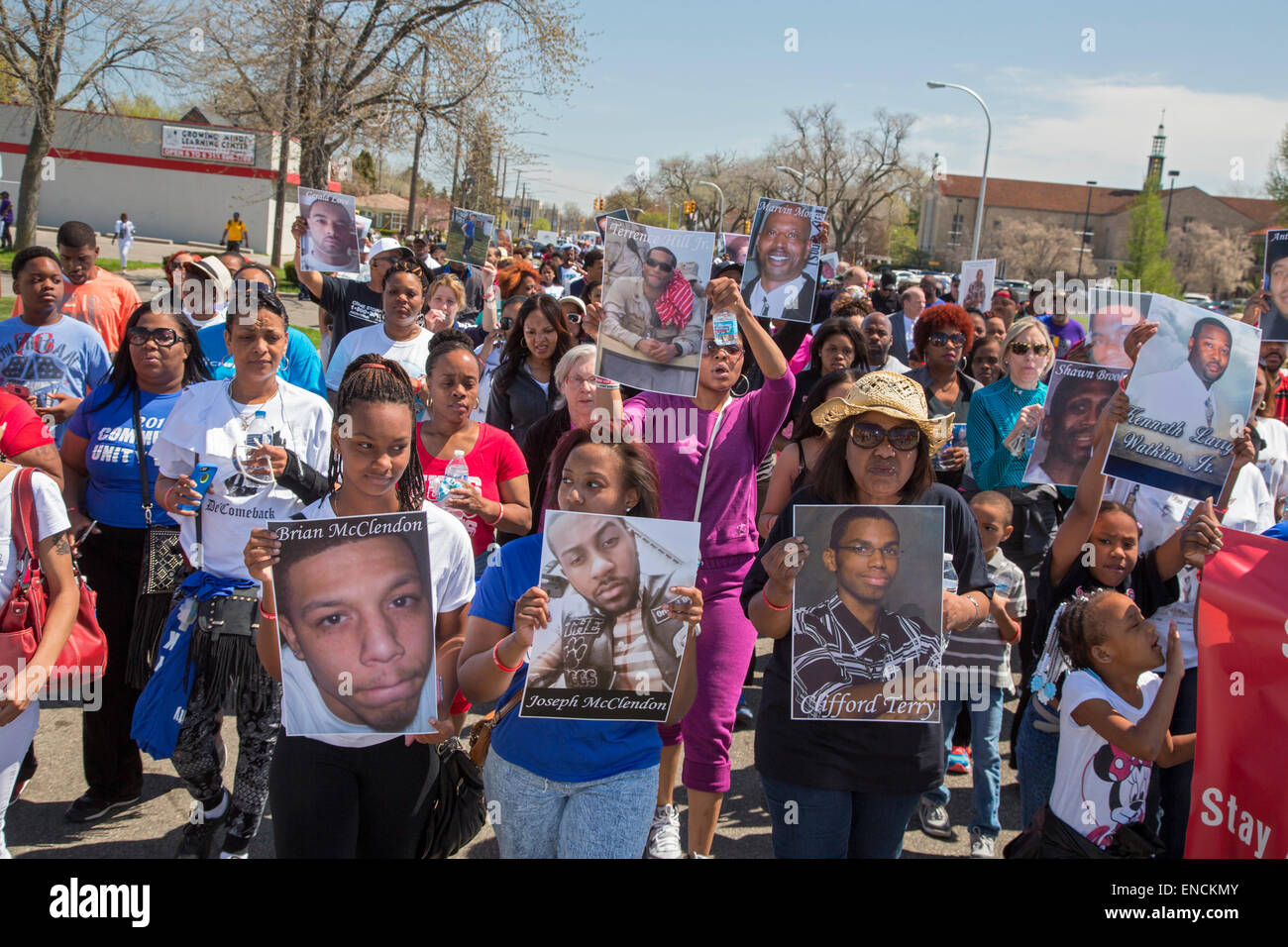 Detroit, Michigan, USA. 2nd May, 2015. Holding pictures of homicide ...