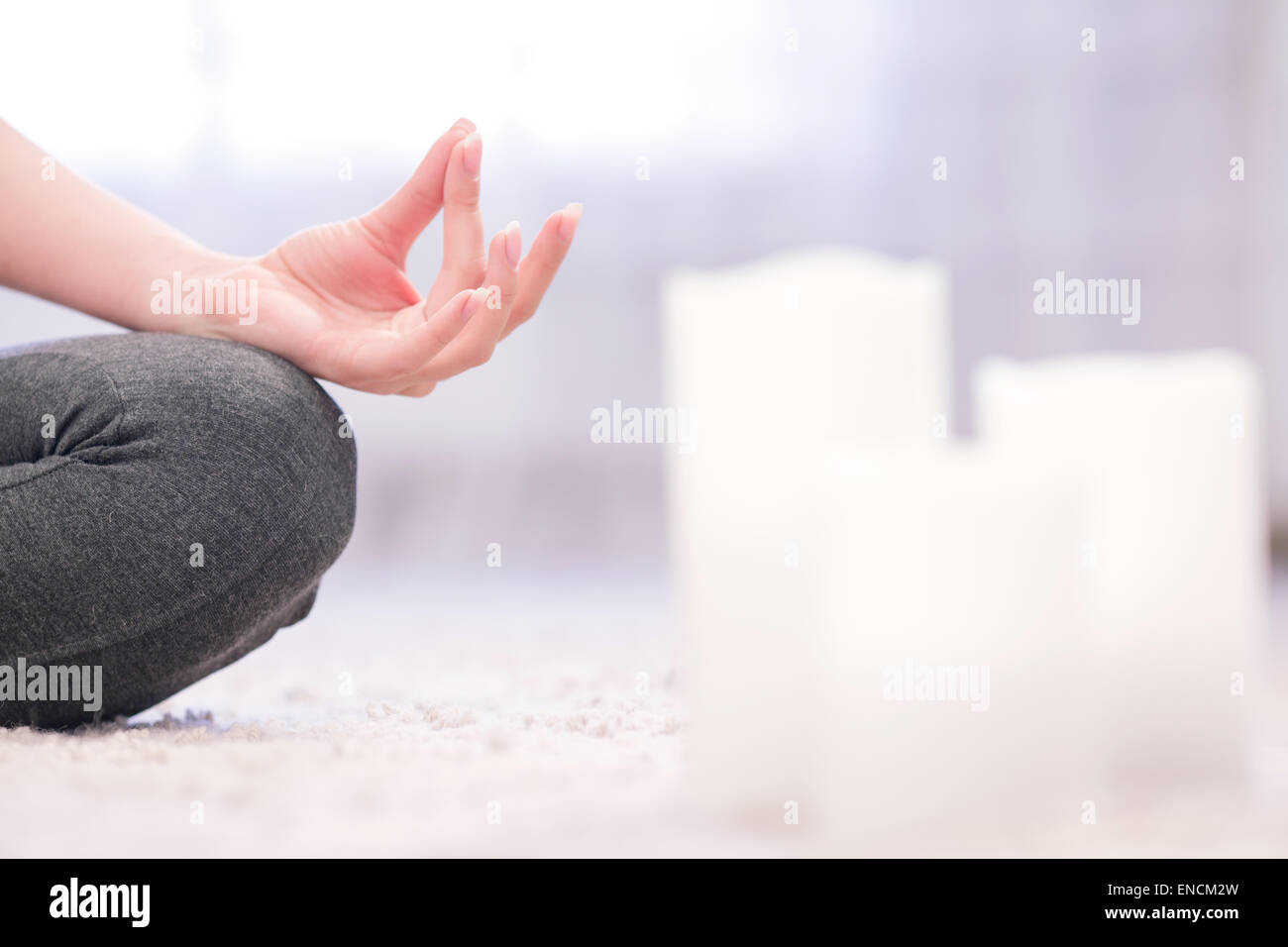 Meditating hand of woman Stock Photo - Alamy