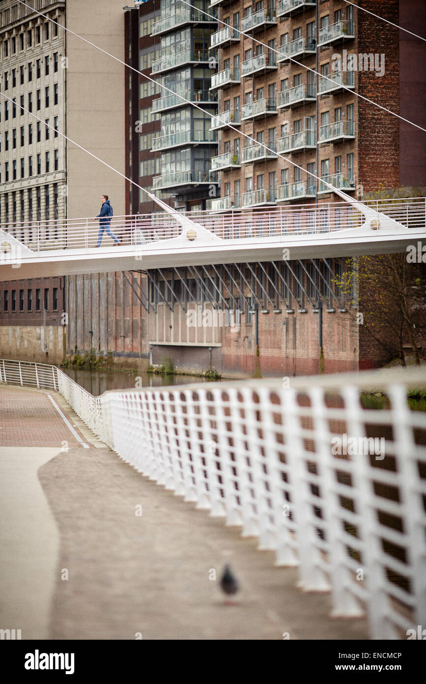 Trinity Bridge is a three-way footbridge which crosses the River Irwell ...