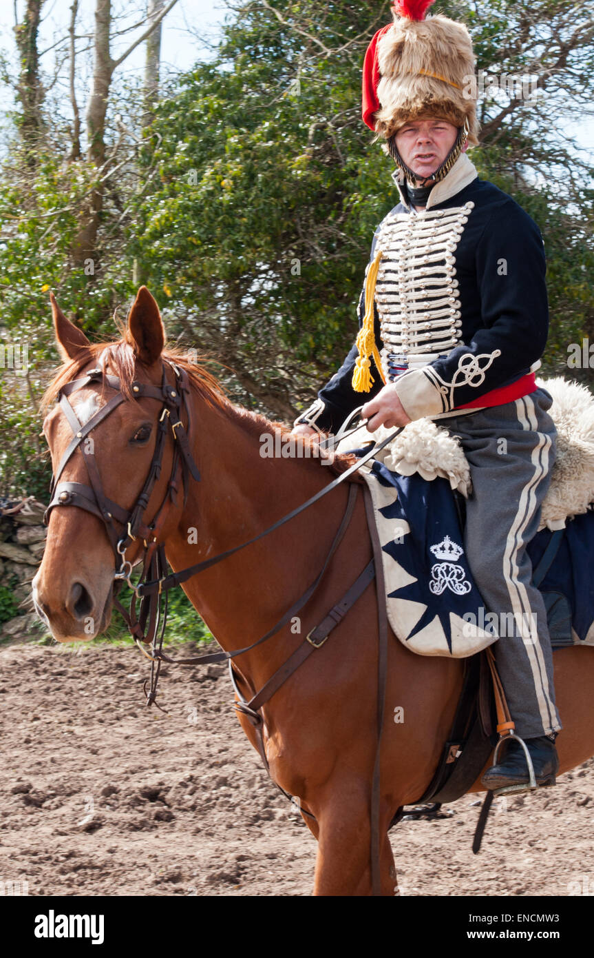 A trooper of Lord Uxbridge's 7th Hussars mounted on his horse preparing ...