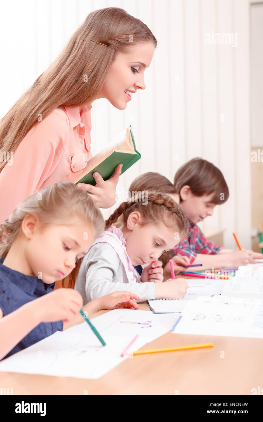 High school kids raise hands hi-res stock photography and images - Alamy