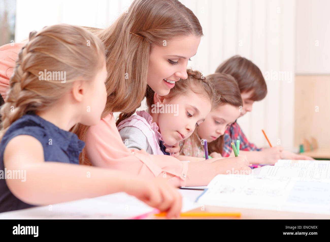 Teacher check homework hi-res stock photography and images - Alamy