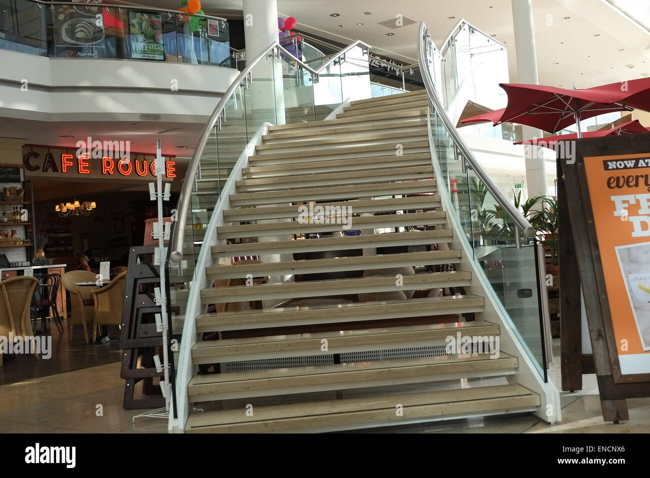 Tall set of steps in a shopping Mall, impossible for the elderly or ...