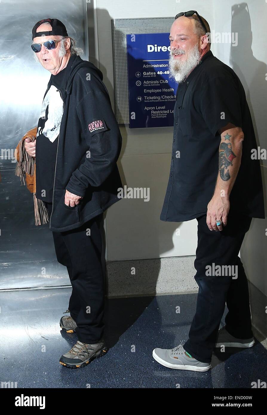 Neil Young arrives at Los Angeles International (LAX) airport Featuring ...