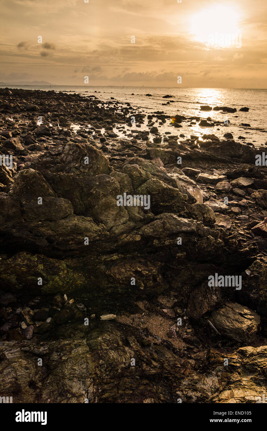 Rock and sea morning light in Thailand Stock Photo - Alamy