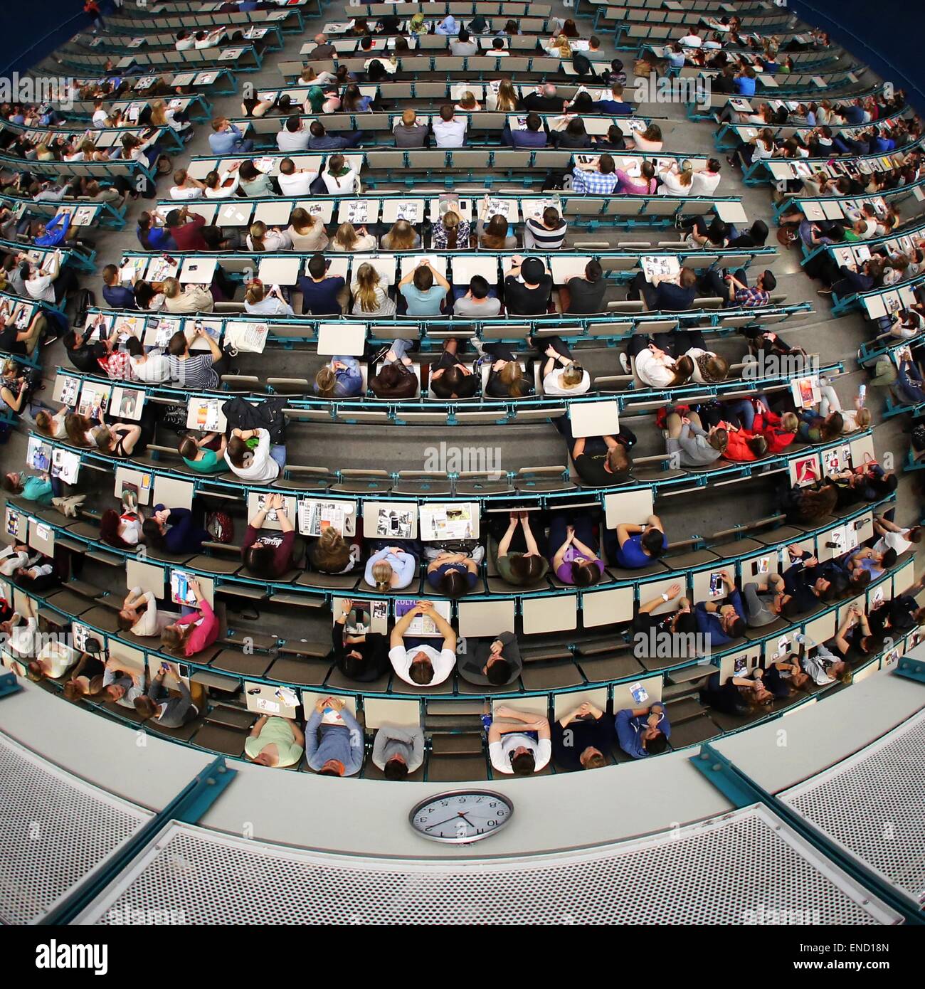 Mainz, Germany. 15th Apr, 2015. First-year students sit during a ...
