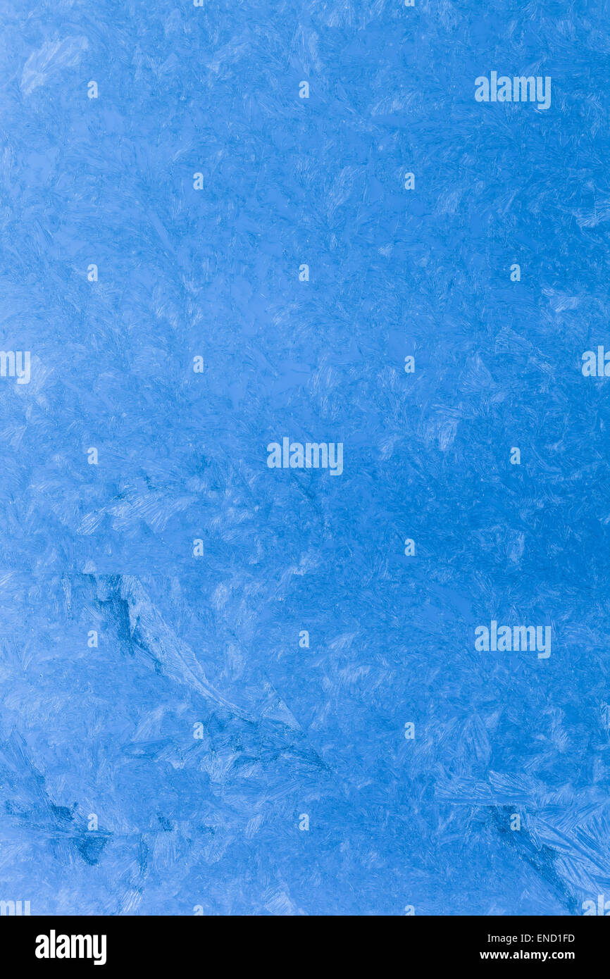 Detail of blue icy frozen surface texture in winter Stock Photo - Alamy