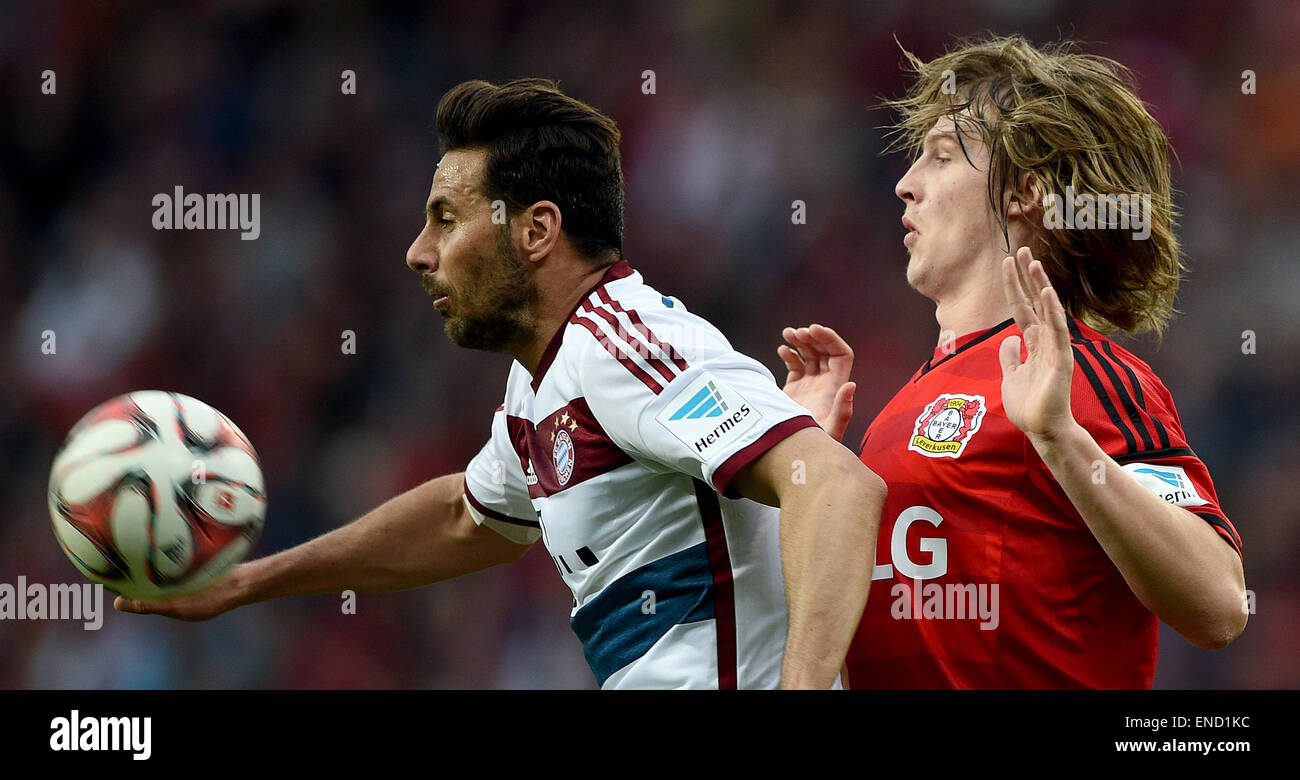 Leverkusen, Germany. 2nd May, 2015. Bayern Munich's Claudio Pizarro (l ...