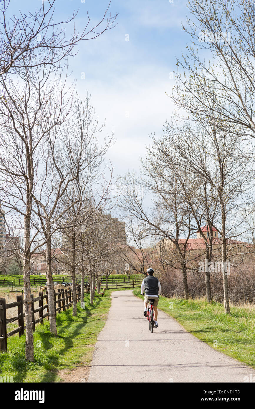 Bike ride in urban park on weekend Stock Photo - Alamy