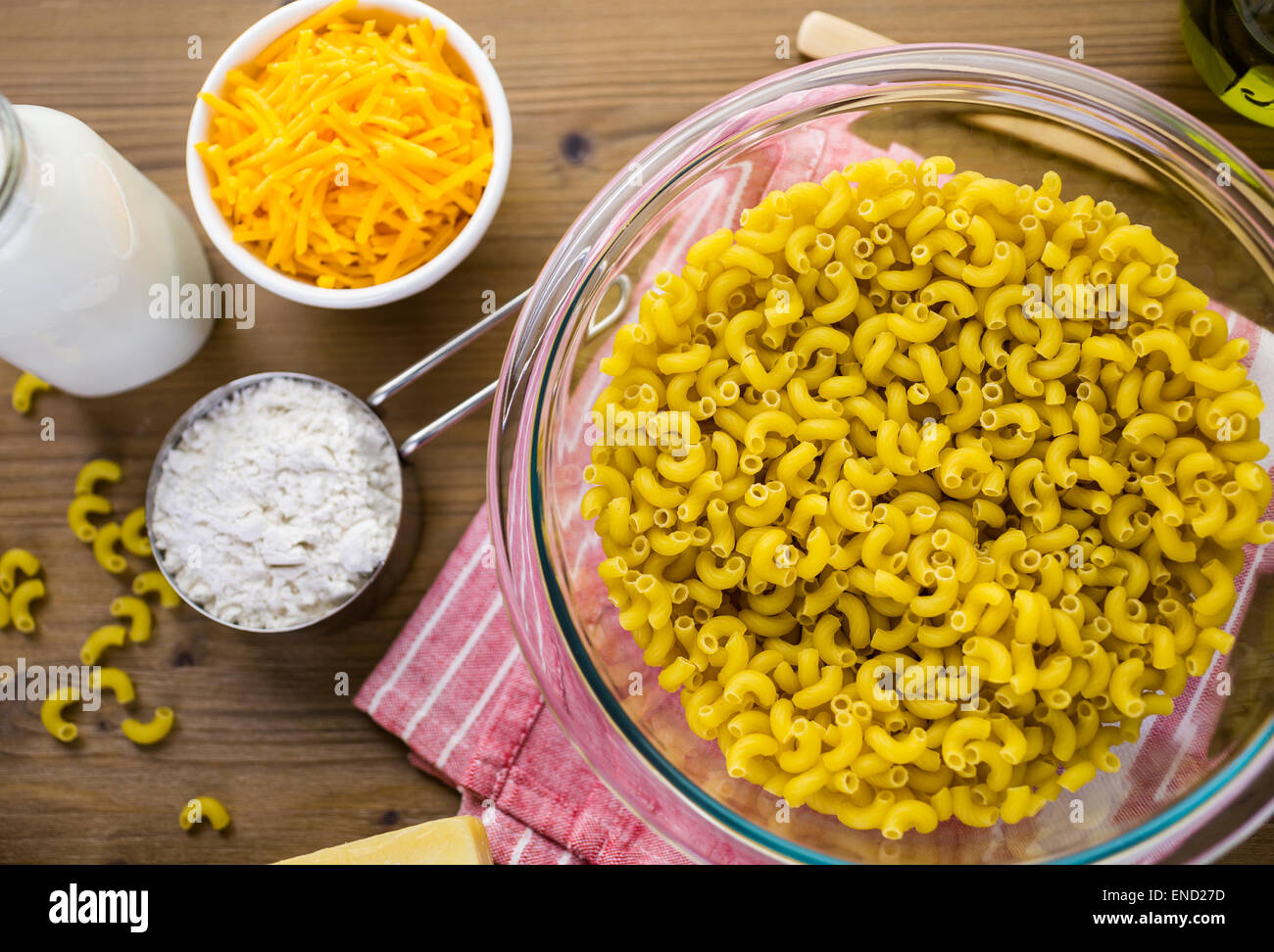Ingredients for preparing macaroni and cheese on a wood table Stock ...