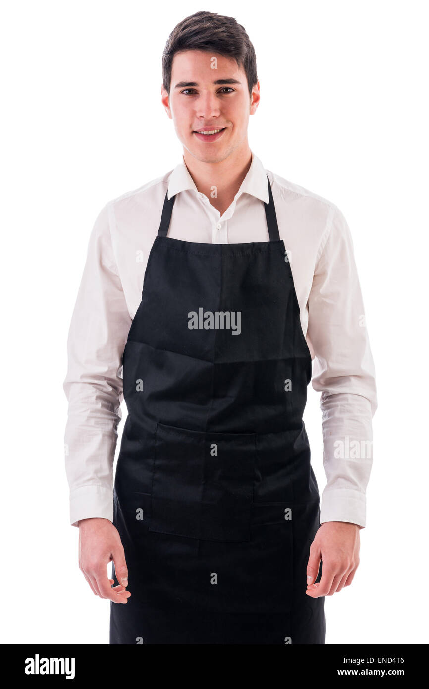 Young chef or waiter wearing black apron isolated Stock Photo - Alamy