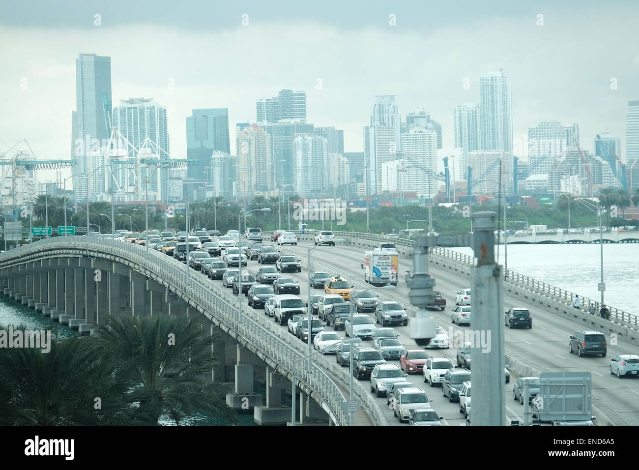 Miami cityscape - heavy traffic over a bridge with Miami skyline in the ...