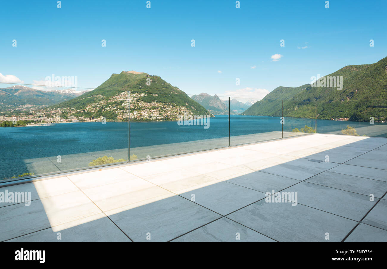 beautiful terrace in modern building, lake view Stock Photo - Alamy