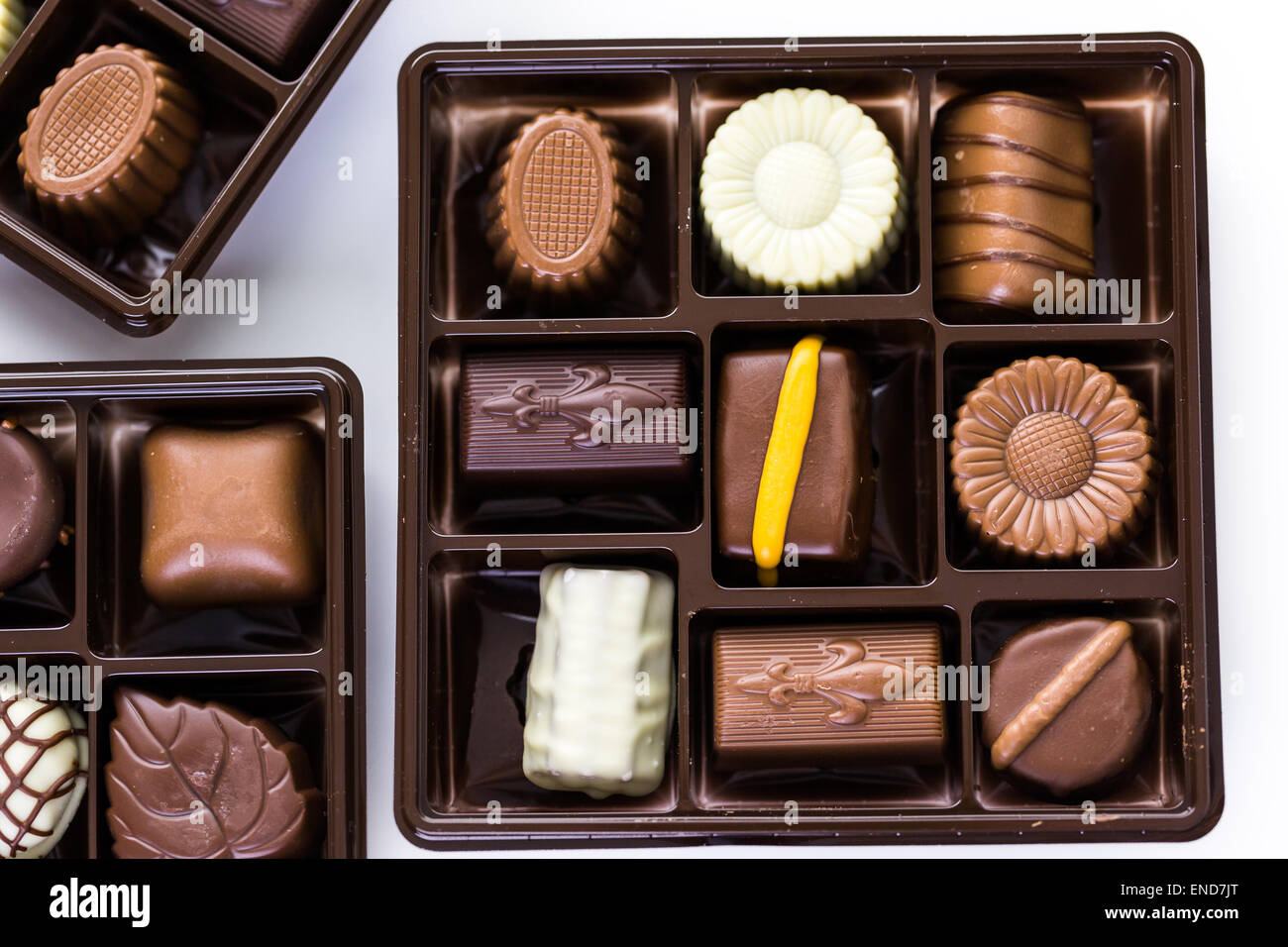 Assorted chocolates in box on a white background Stock Photo - Alamy
