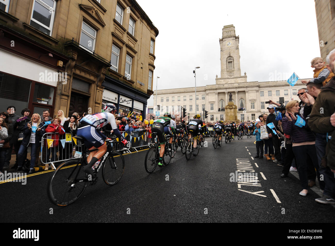 Barnsley, UK. 3rd May 2015. Cyclists riding the Tour de Yorkshire pass ...