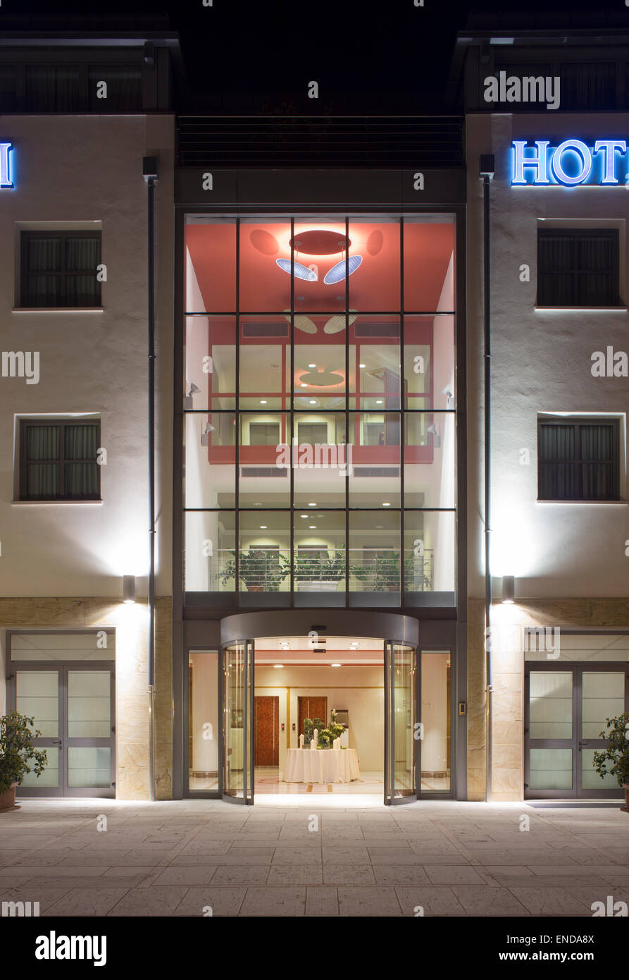 Hotel facade at night Stock Photo - Alamy
