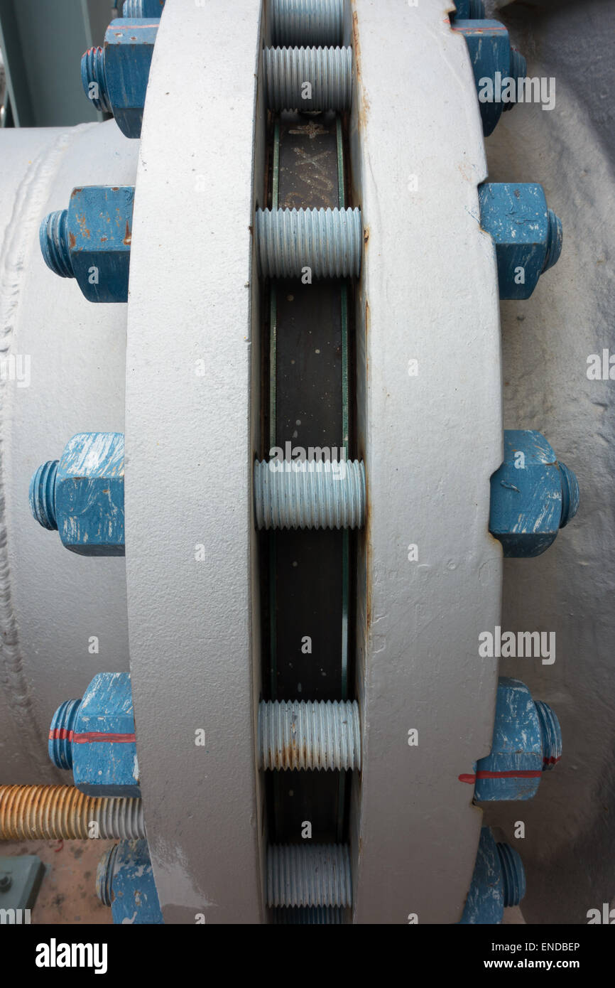 Typical polymer coated bolts and nuts connecting flanges Stock Photo ...