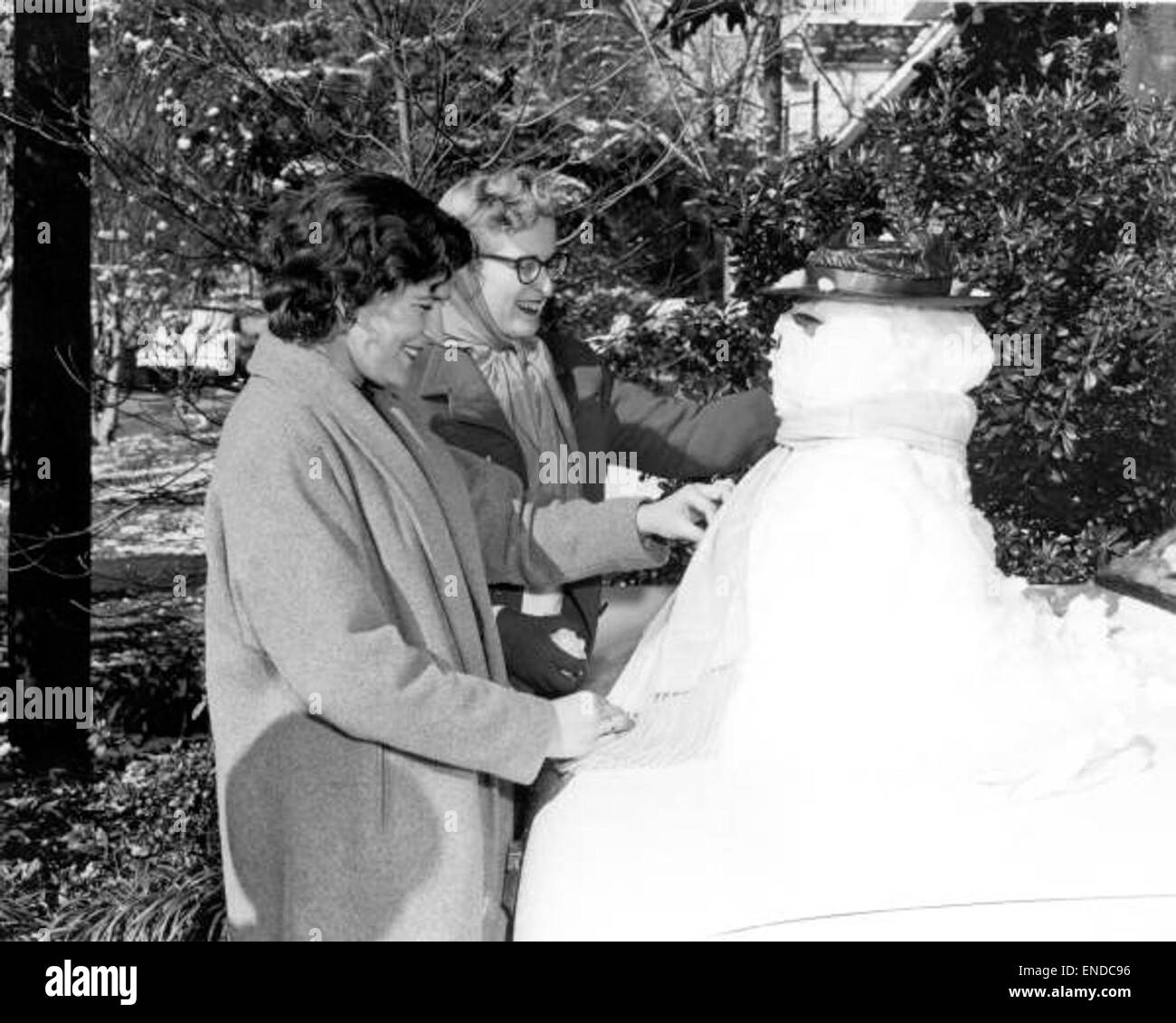 This image shows Florida State University students building a snowman ...