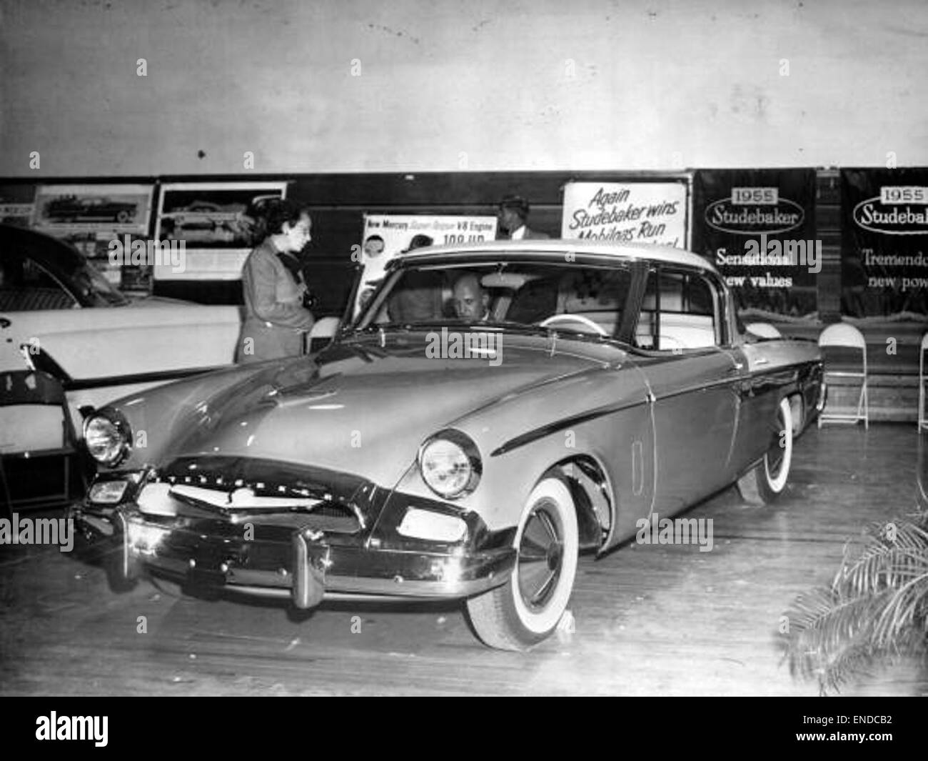 The image shows a Studebaker car displayed in a showroom in Leesburg ...