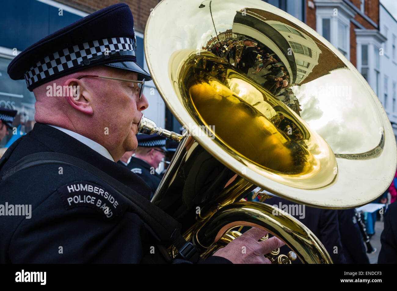 An officer of the Humberside Police Band plays trombone in a public ...