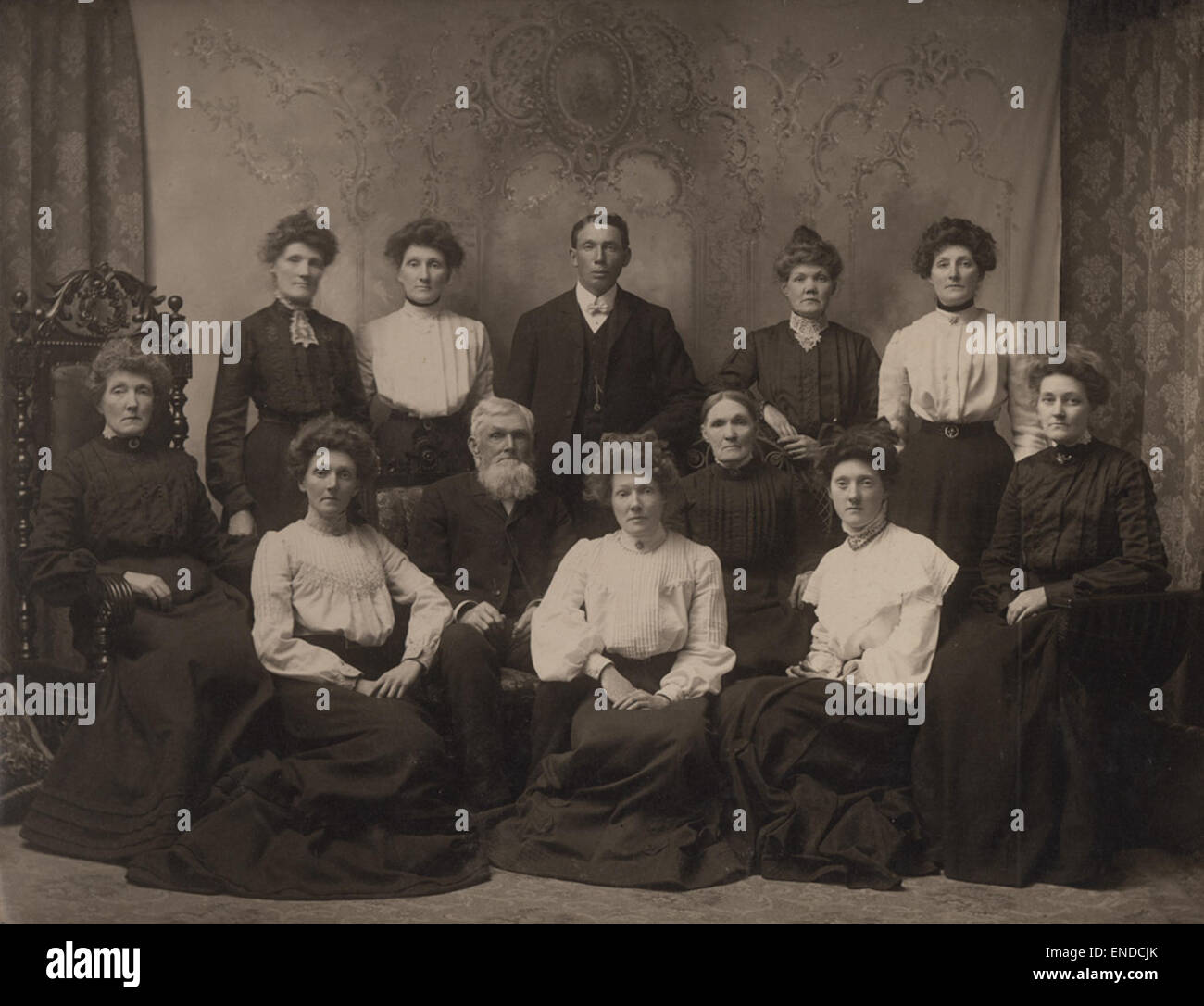 This group portrait of Mr. & Mrs. Elliott and their family captures a ...