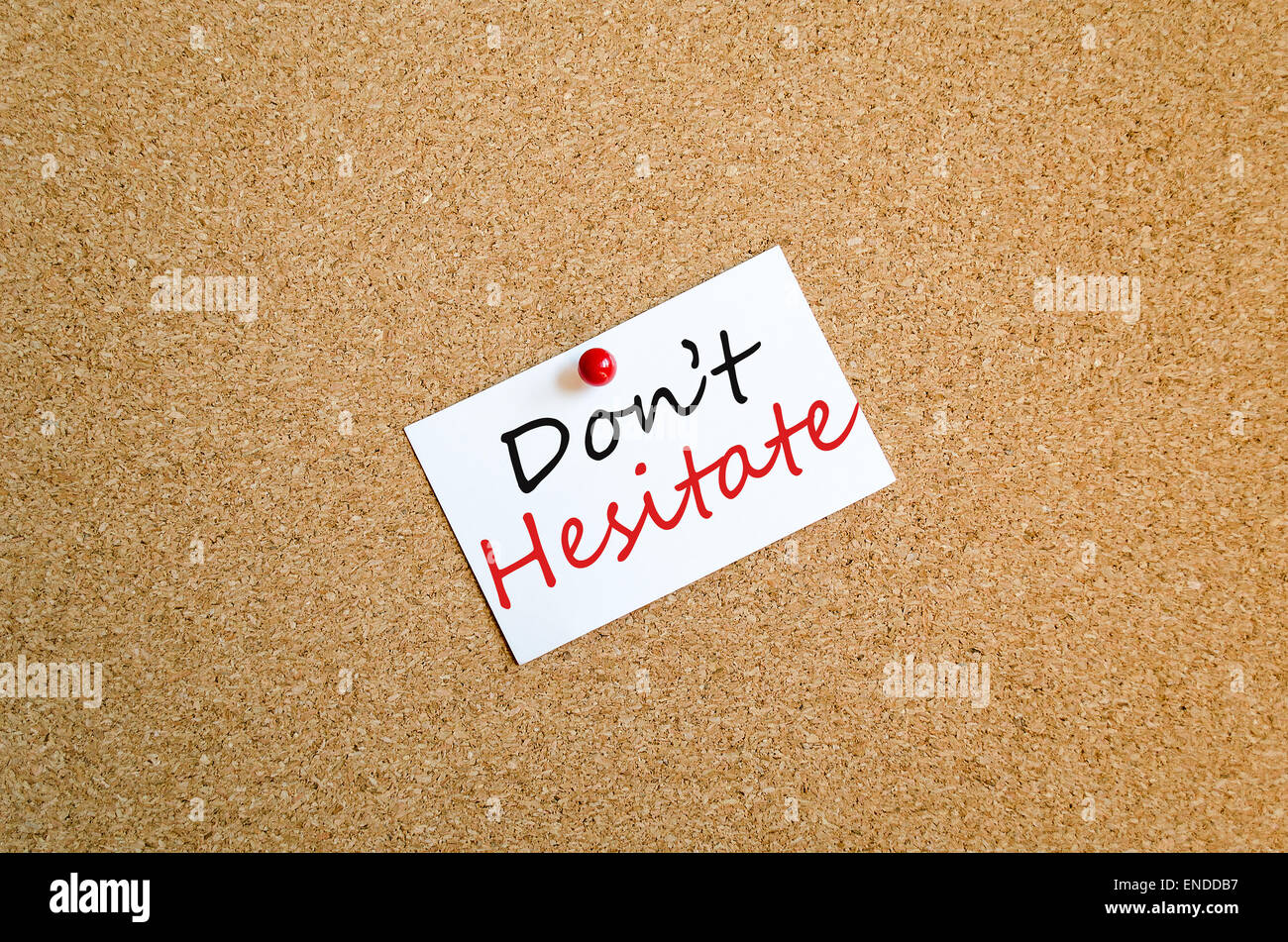 Sticky Note On Cork Board Background Don't Hesitate Concept Stock Photo ...