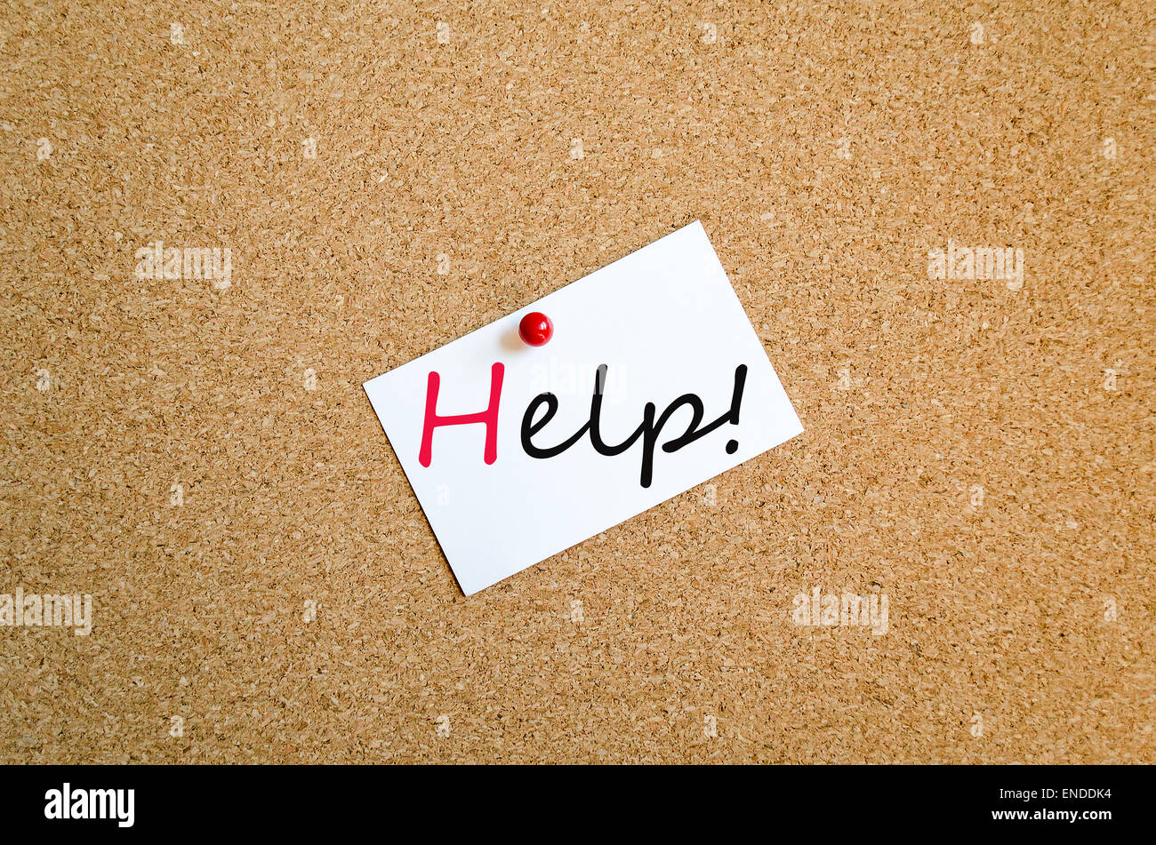 Sticky Note On Cork Board Background Help Concept Stock Photo - Alamy