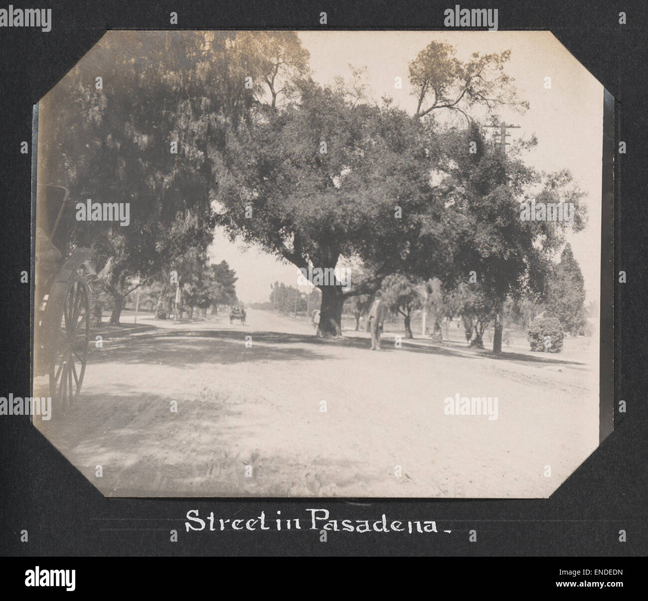 A street scene from Pasadena, California, captures vintage carriages ...