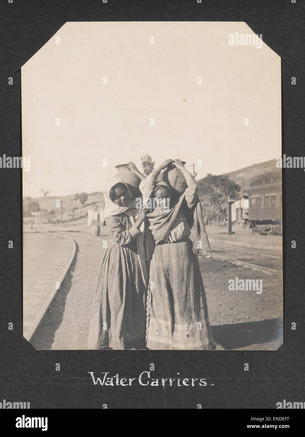 This depiction of water carriers illustrates the daily life of ...