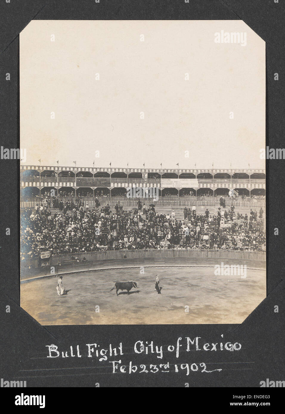 This historical photograph captures a bullfight held in the City of ...