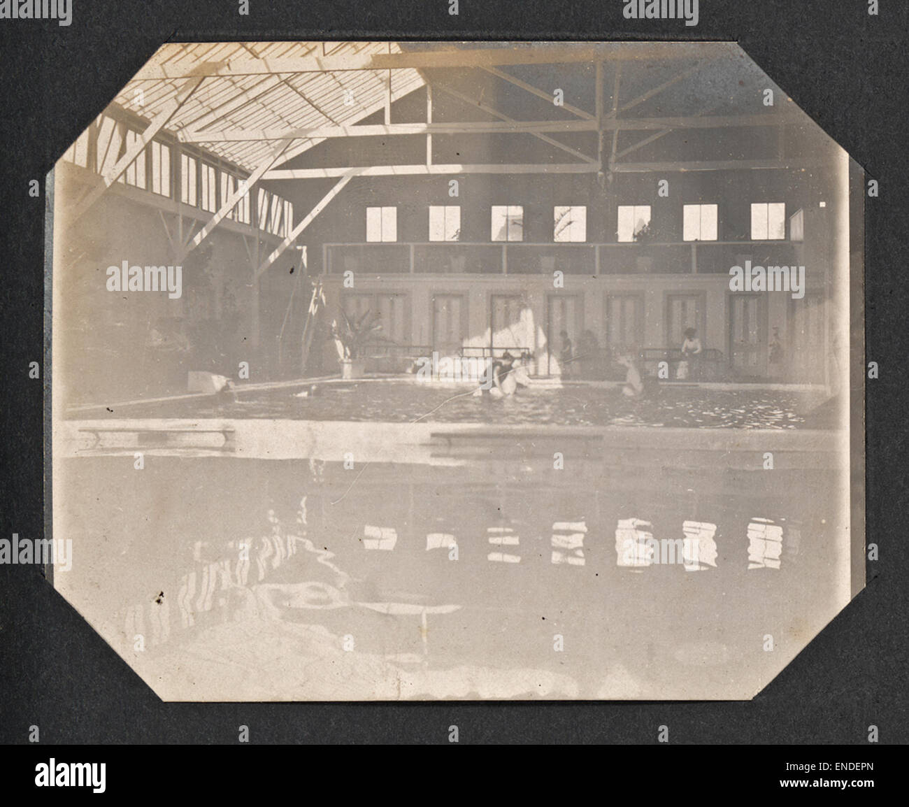 A vintage photograph showing an indoor swimming pool in the U.S. West ...