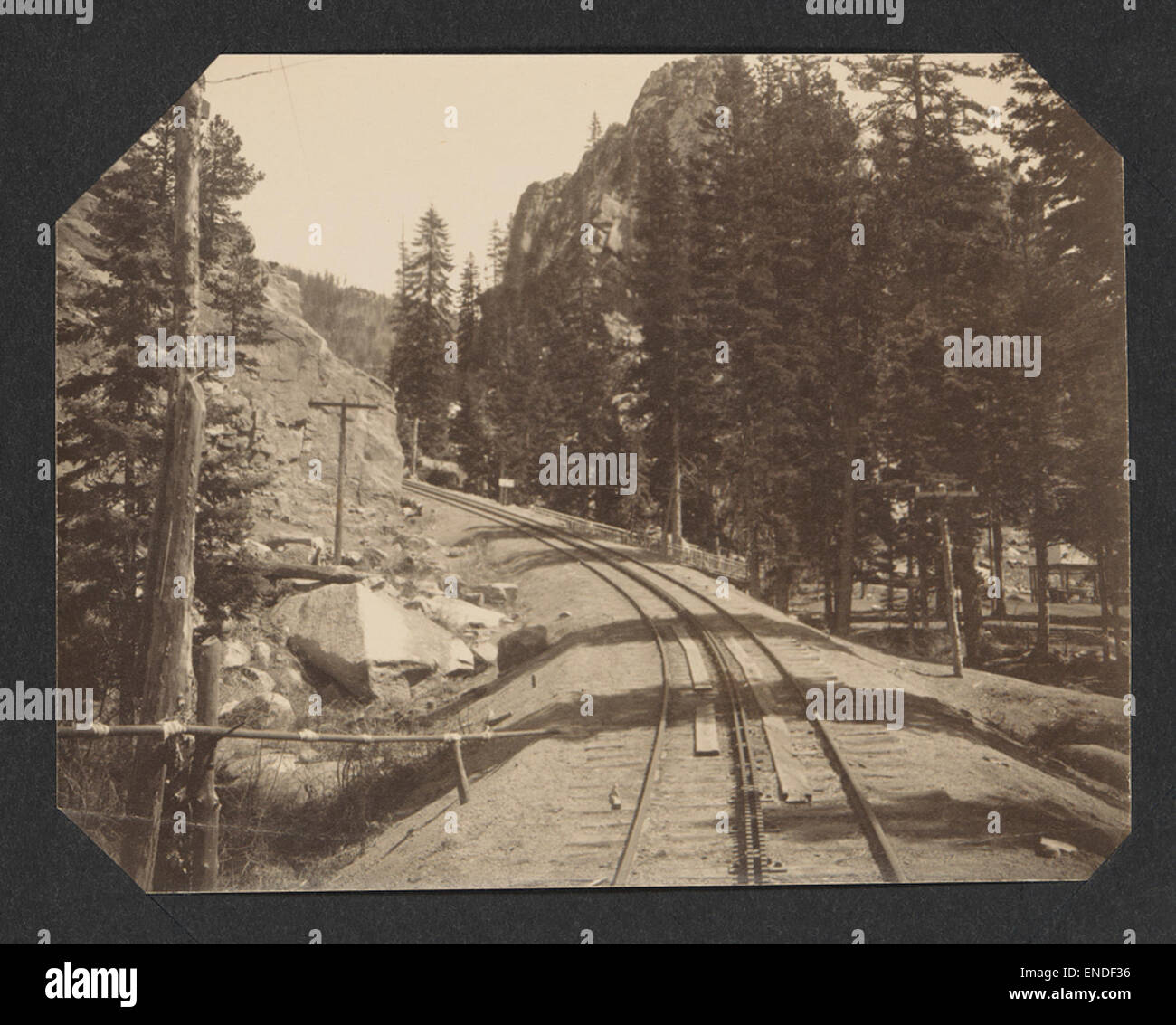 This photograph depicts the rugged mountain railroad tracks in the U.S ...