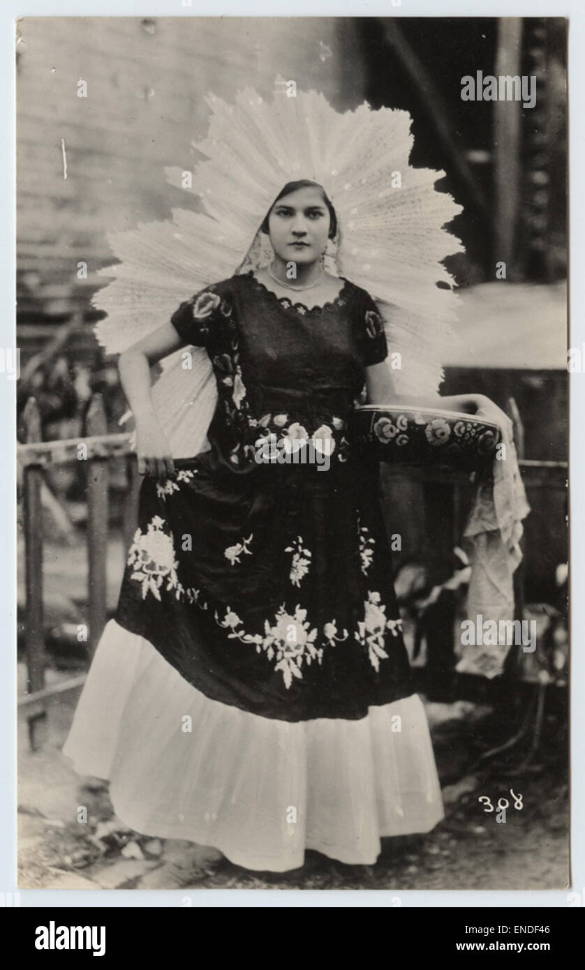 A real photo postcard (RPPC) of a Tehuana woman holding a bowl, dressed ...