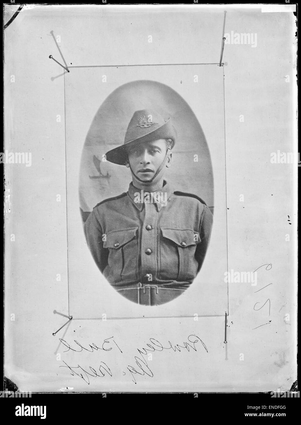 This photograph by Rowley Bell depicts deceased soldiers in uniform ...