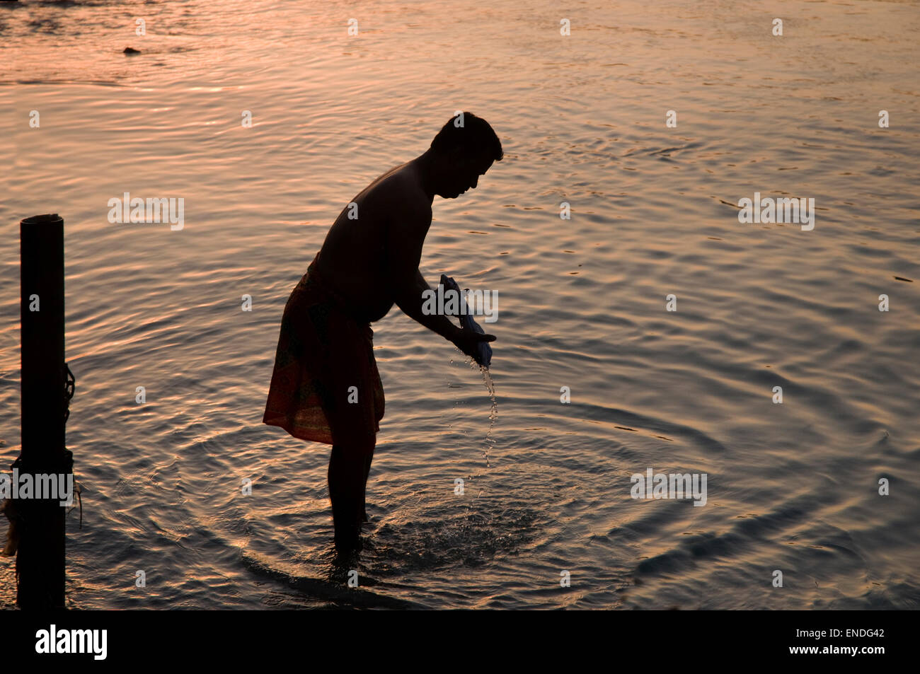 INDIA, Uttarakhand, Rishikesh, performing ritual washing in the River ...