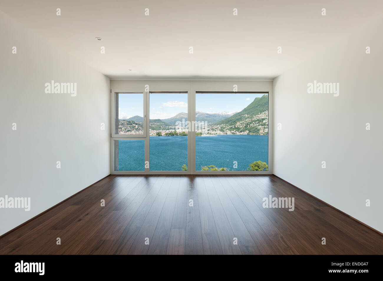 beautiful modern house, empty room with window overlooking the lake ...