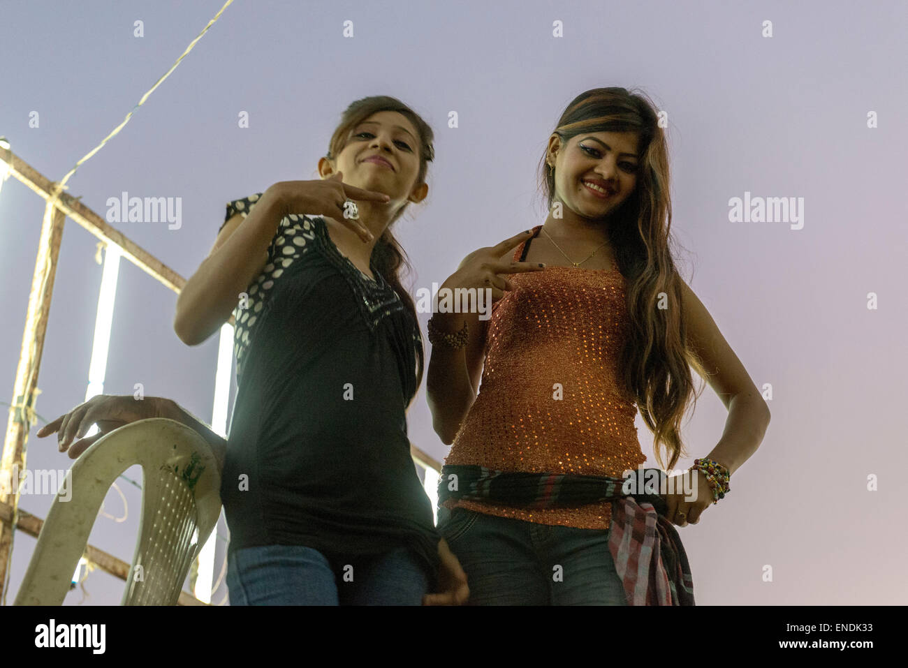 Girls In Front Of Wall Of Death, Vautha Mela Stock Photo - Alamy