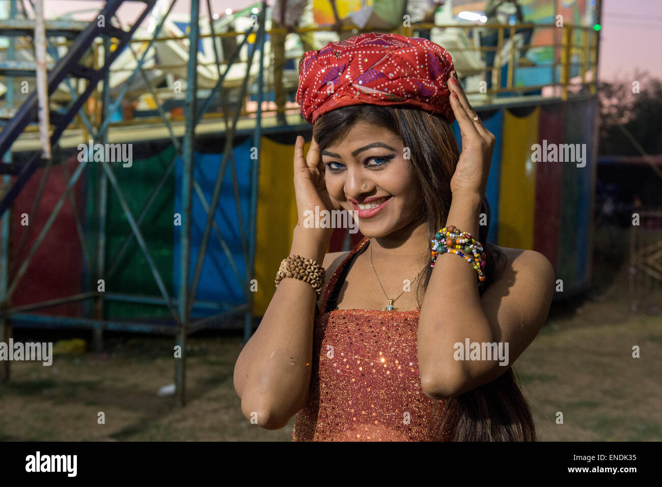 Girl Wearing Hat At Wall Of Death, Vautha Mela Stock Photo - Alamy
