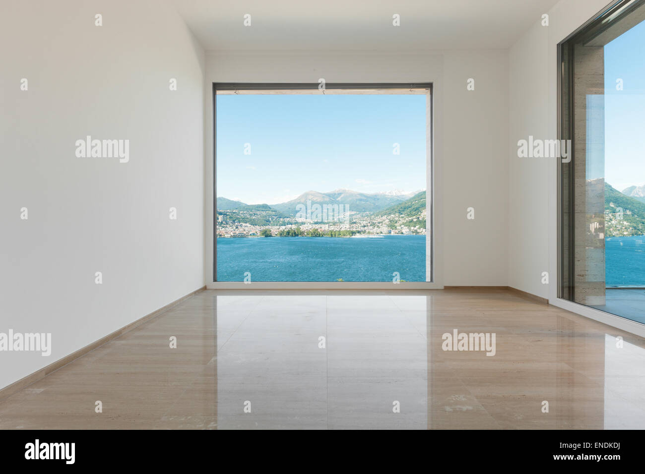 beautiful modern house, empty room with window overlooking the lake ...