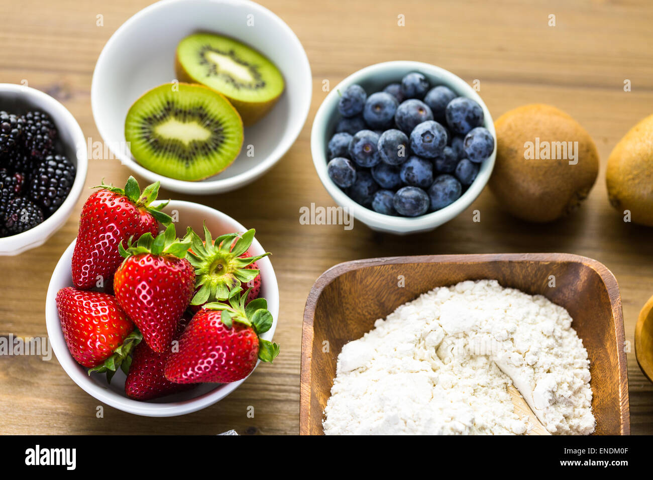 Ingredients for preparing fresh fruit tart Stock Photo - Alamy