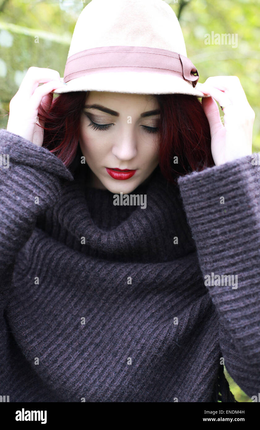 Holding up hat hi-res stock photography and images - Alamy