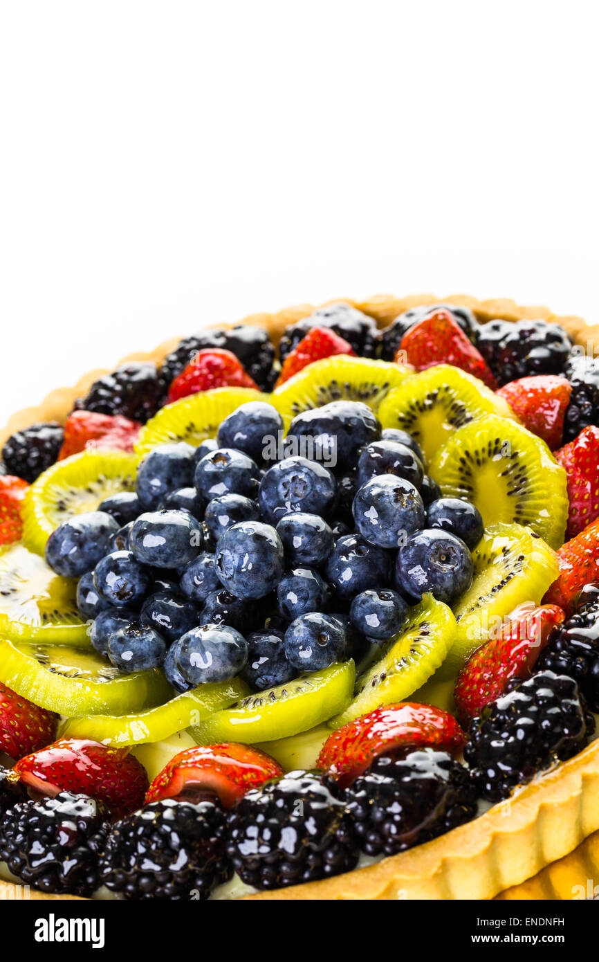 Fresh fruit tart made in large round form on a white background Stock ...