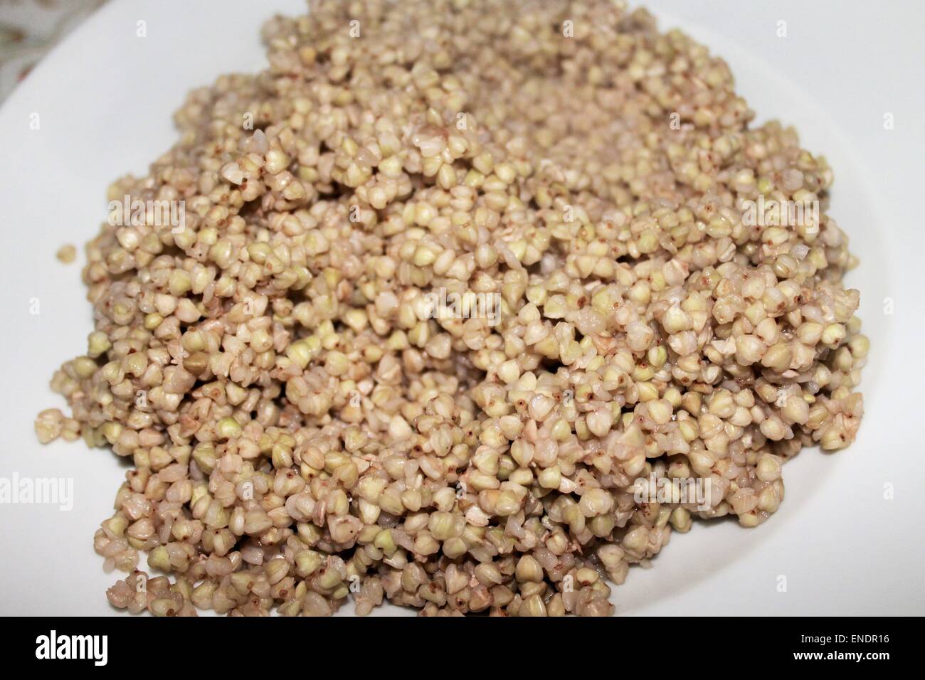 cooked buckwheat in the plate Stock Photo - Alamy